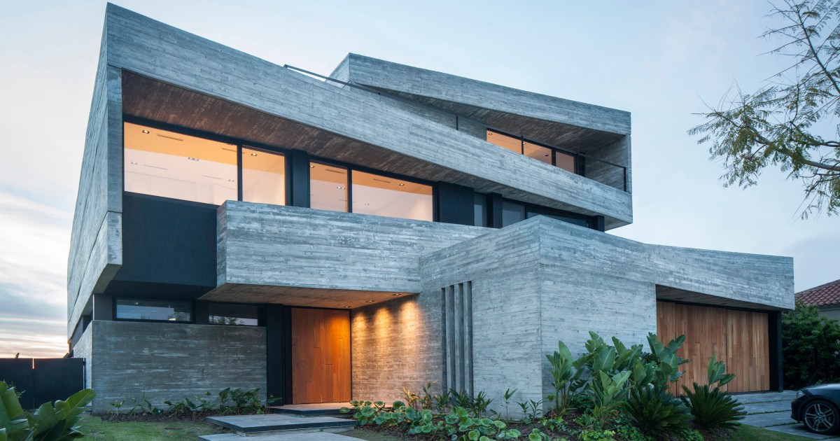El sello inconfudible de Andrés Remy en esta casa con vista al lago ...